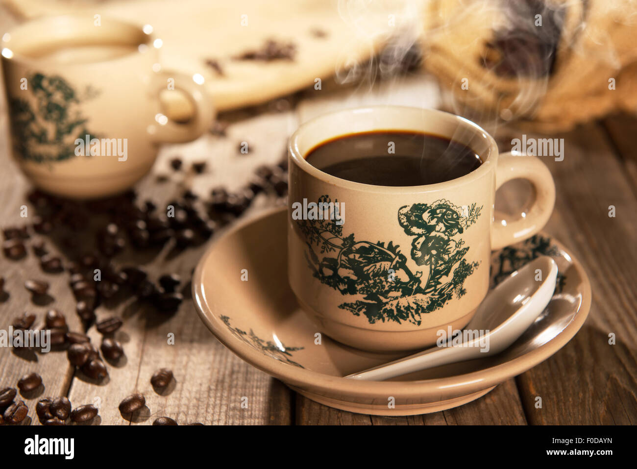 Steaming traditional Chinese nan yang style coffee in vintage mug and ...