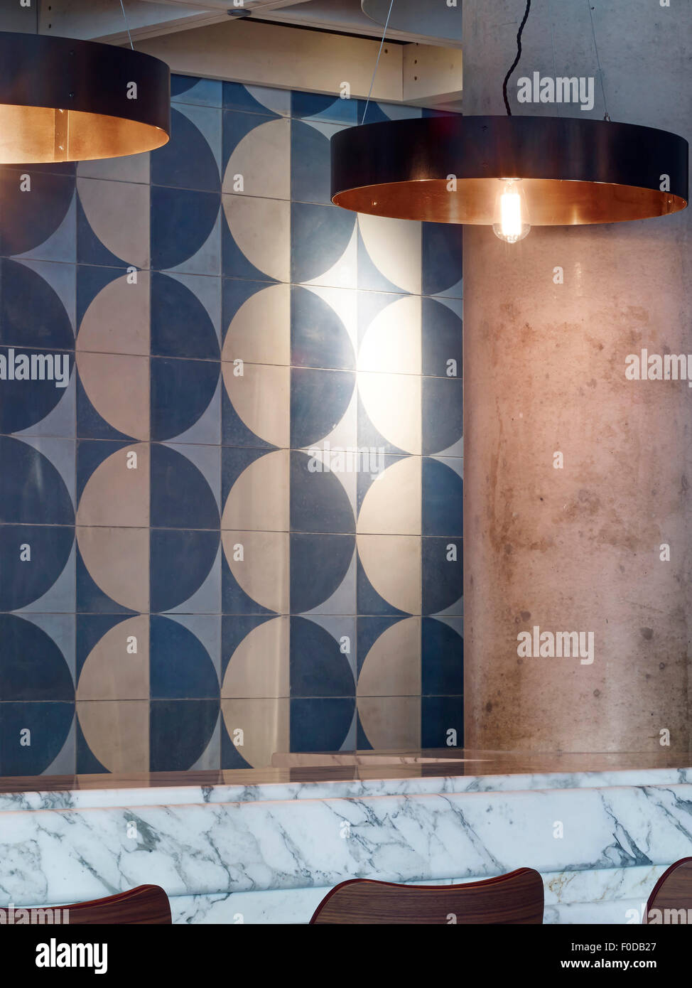 Juxtaposition of tiles, concrete and marble counter. Jamie's Italian ...