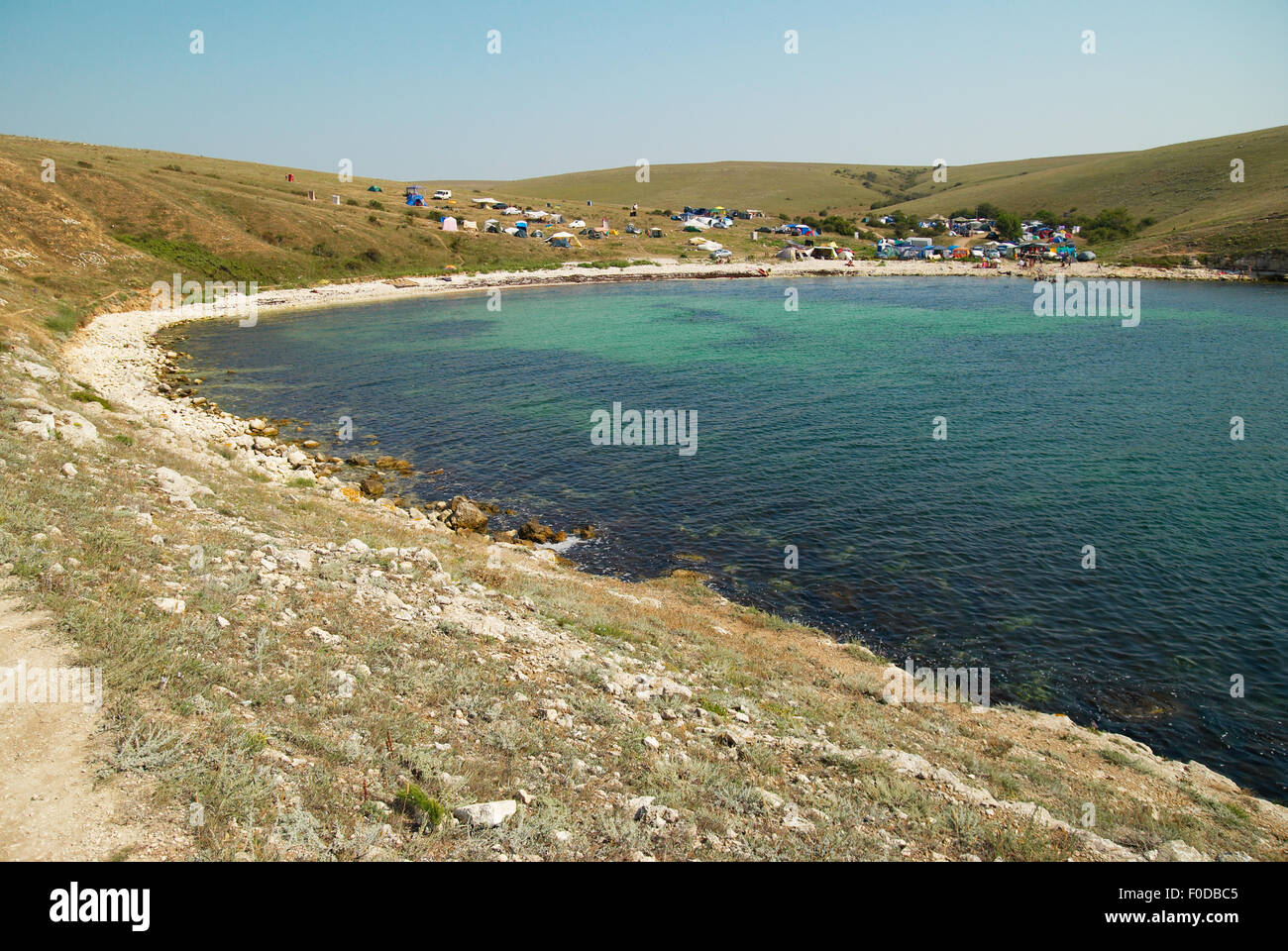 A bay with blue ocean water Stock Photo - Alamy