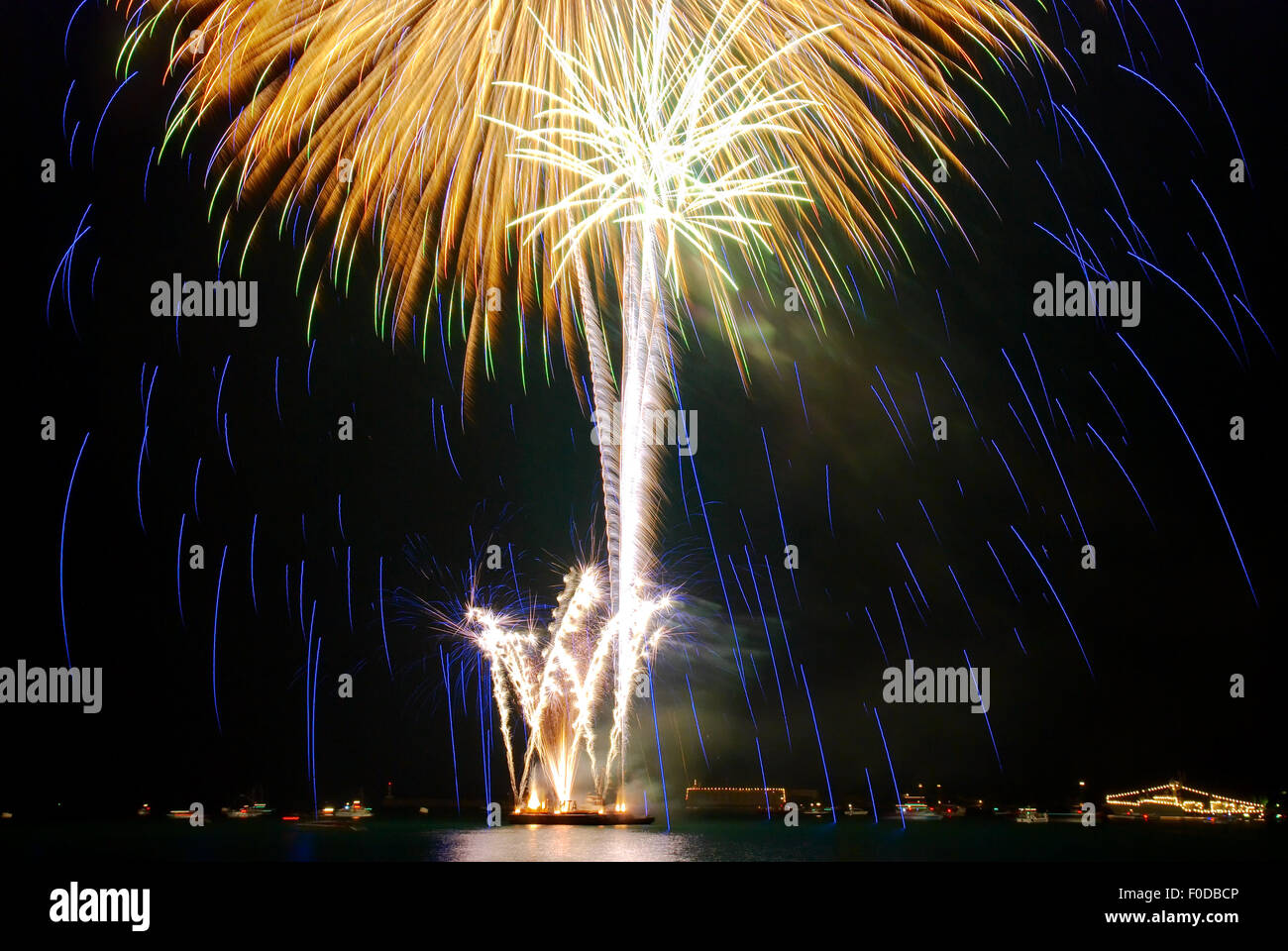 Brightly exploding fireworks lighting hi-res stock photography and ...