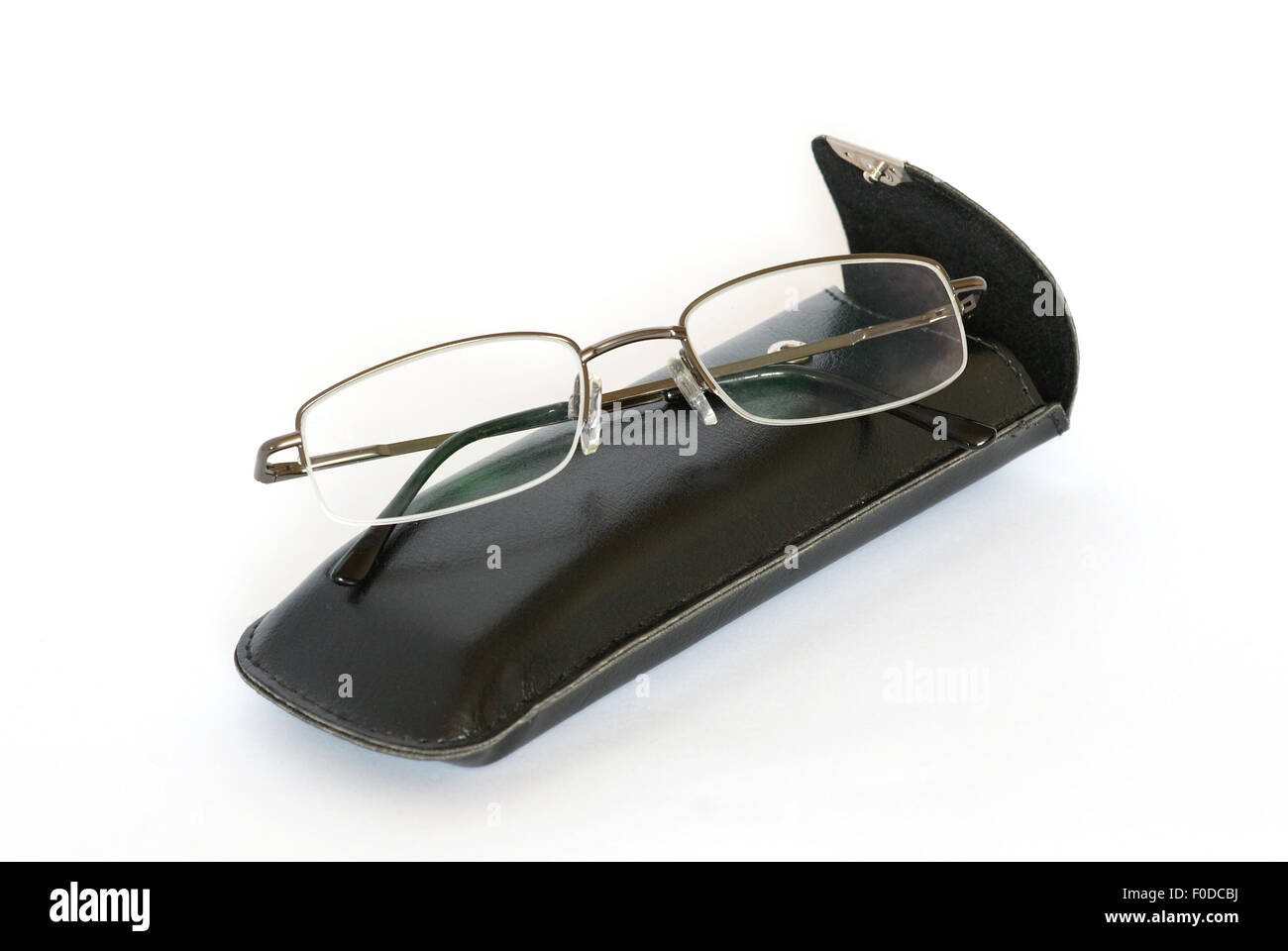 Spectacles and spectacle-case isolated on white Stock Photo - Alamy