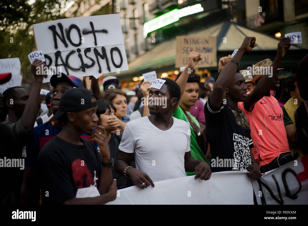 Demonstrators during a march against racism and police in Barcelona ...
