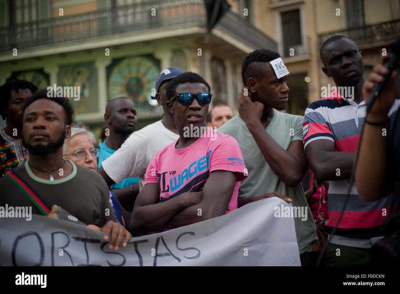 Demonstrators during a march against racism and police in Barcelona ...