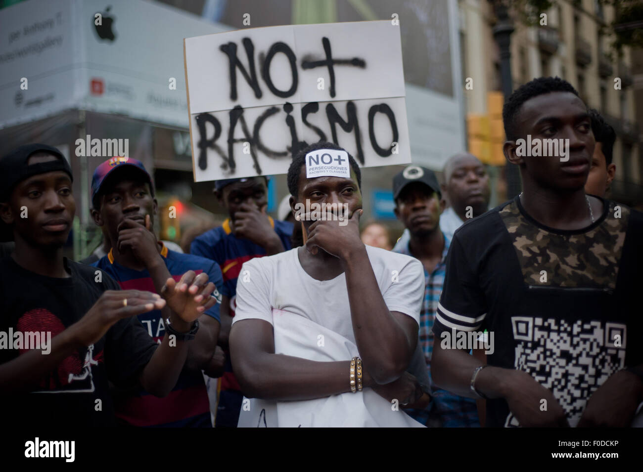Demonstrators during a march against racism and police in Barcelona ...