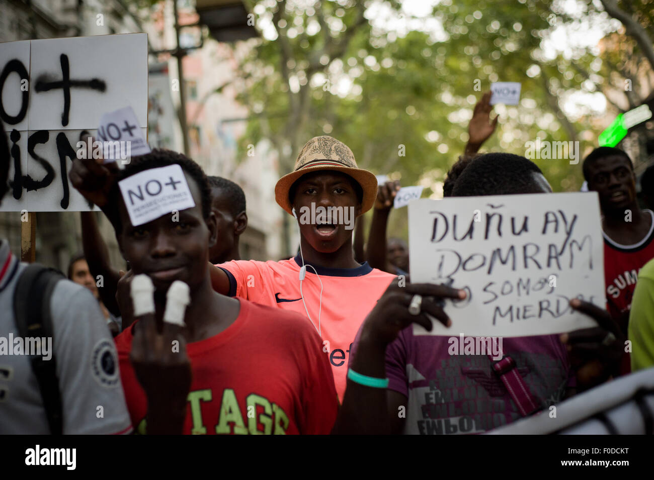 Demonstrators during a march against racism and police in Barcelona ...