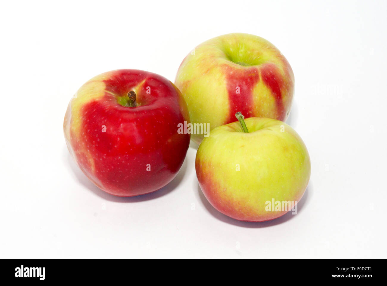 Three fresh apples isolated on white Stock Photo - Alamy