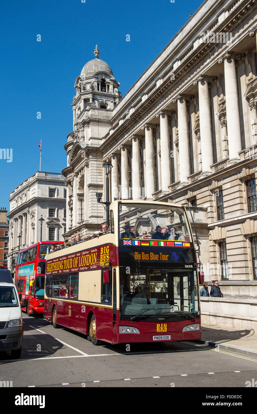Open top sightseeing bus touring the City of London, England Stock ...
