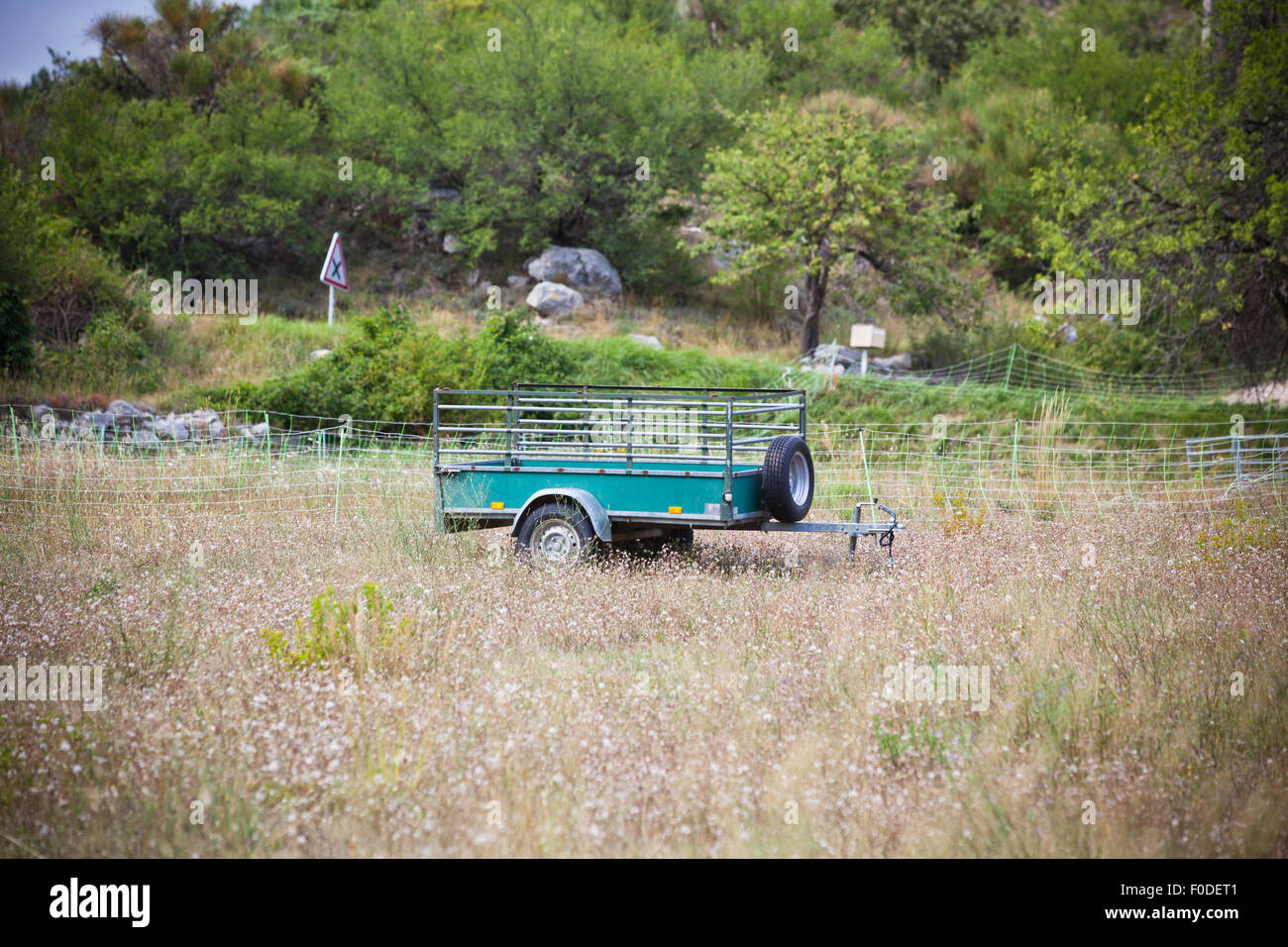 Old cargo trailer in a rural place. Vintage filtered shot Stock Photo ...