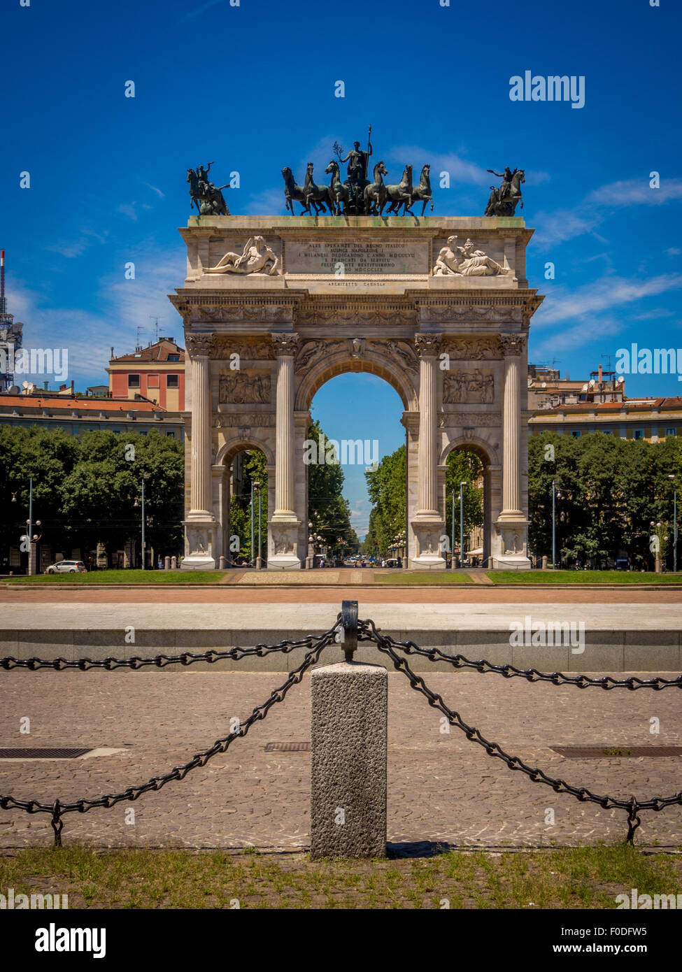 Arco della Pace or Arch of Peace seen against a blue sky. Milan, Italy ...