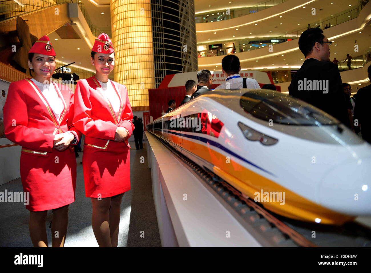 Jakarta, Indonesia. 13th Aug, 2015. Models pose beside a Chinese high ...