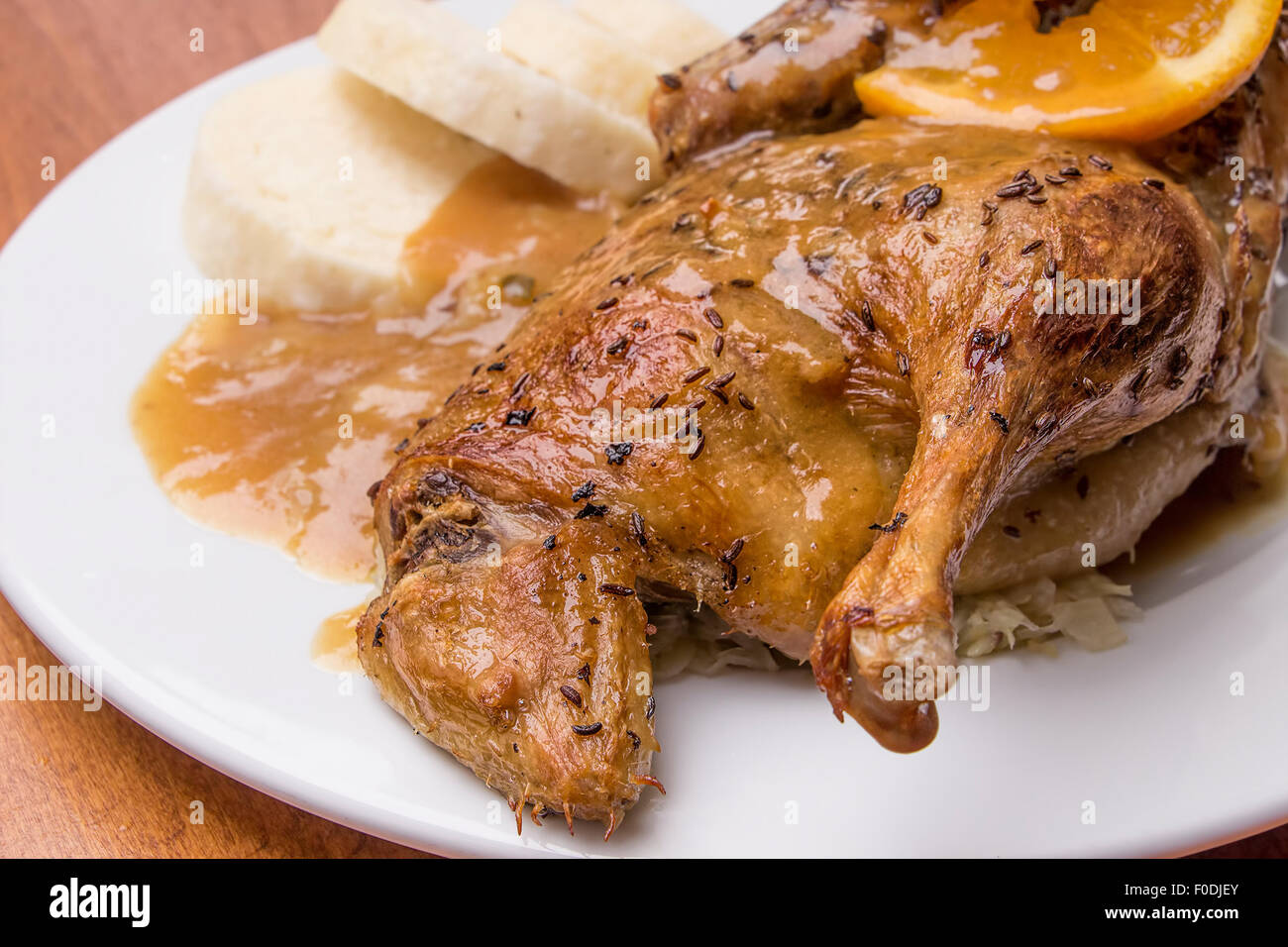 Roast duck with dumplings, typical Czech or German cuisine or dish ...