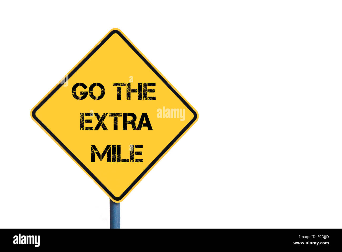 Yellow road sign with Go The Extra Mile message isolated on white ...