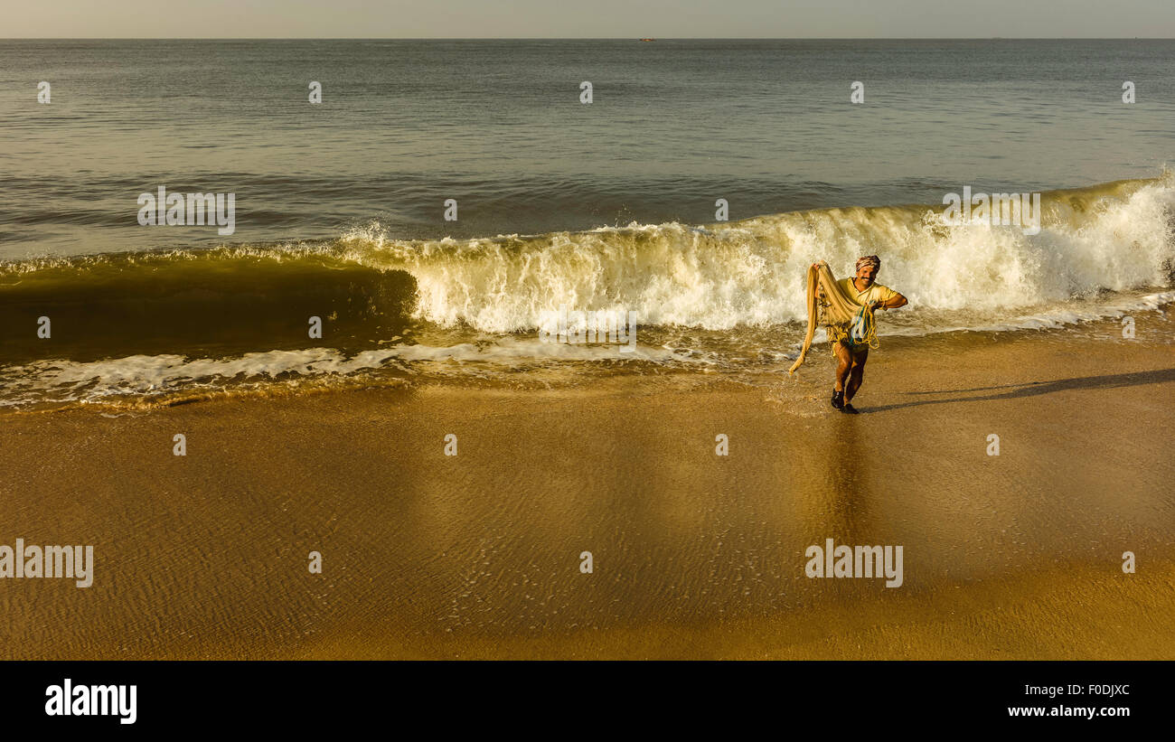 Man running from wave hi-res stock photography and images - Alamy