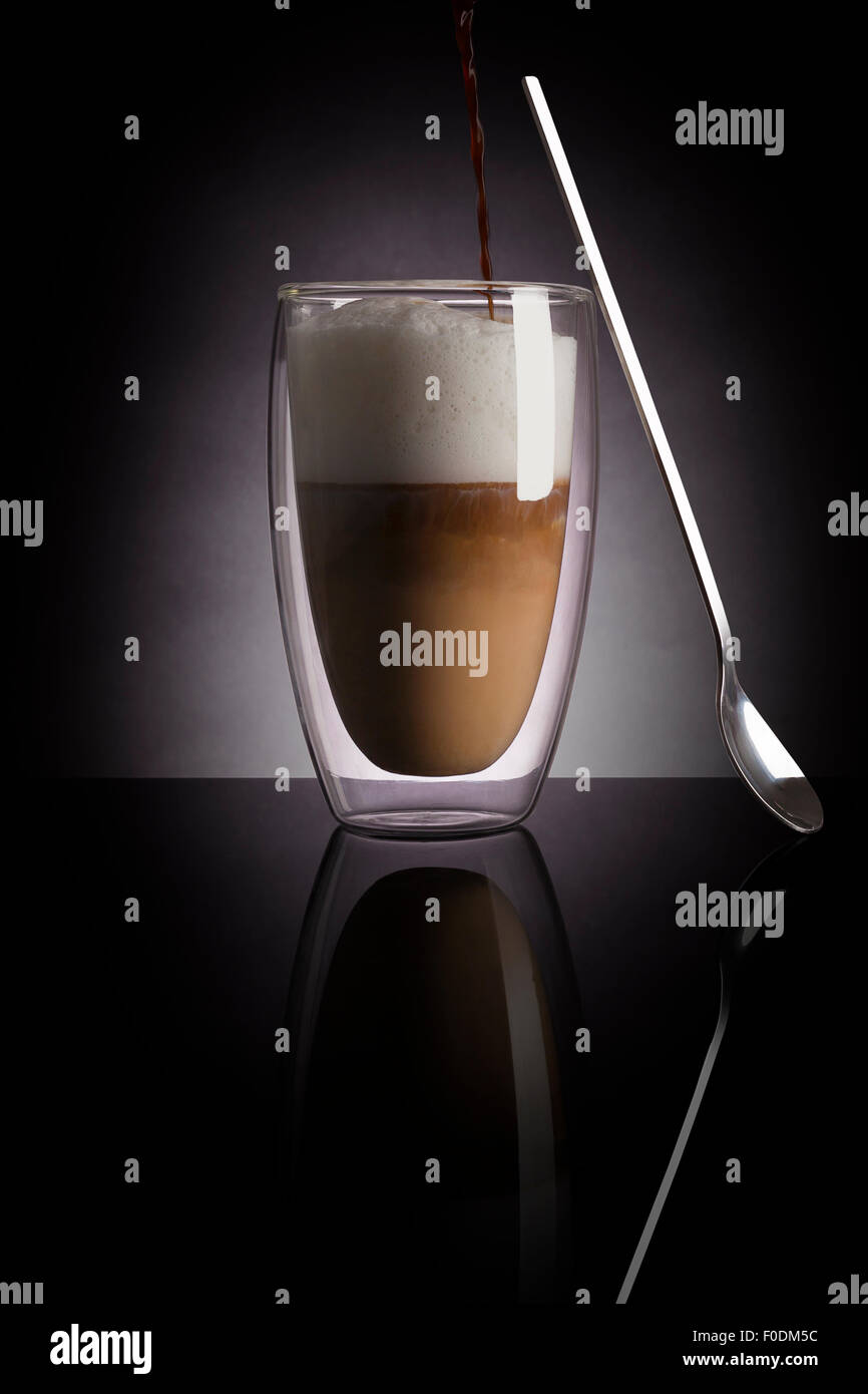 Caffe latte on dark background. Culinary coffee drinking Stock Photo ...