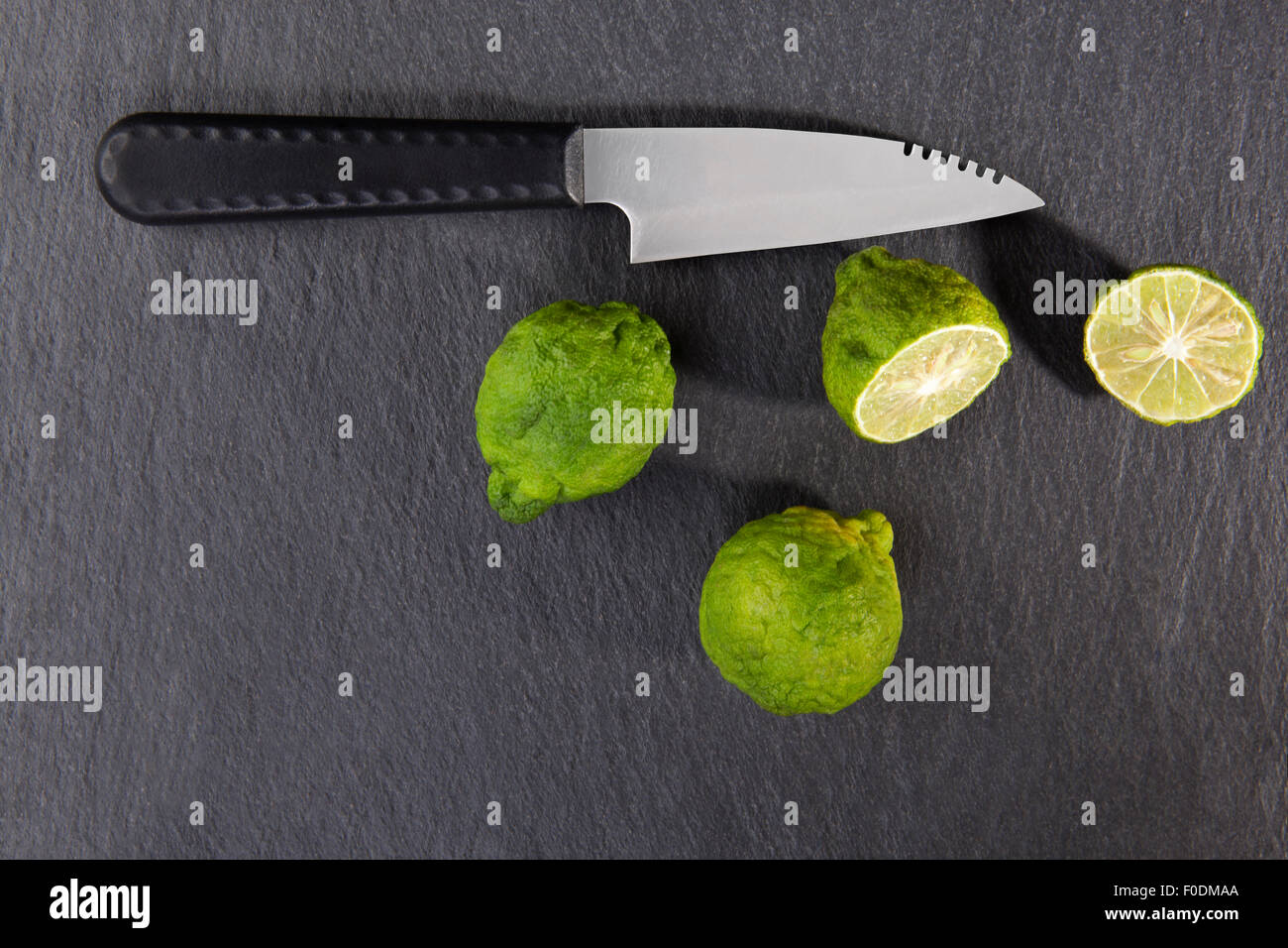 Ripe bergamot fruit on black background, top view. Culinary cooking ...
