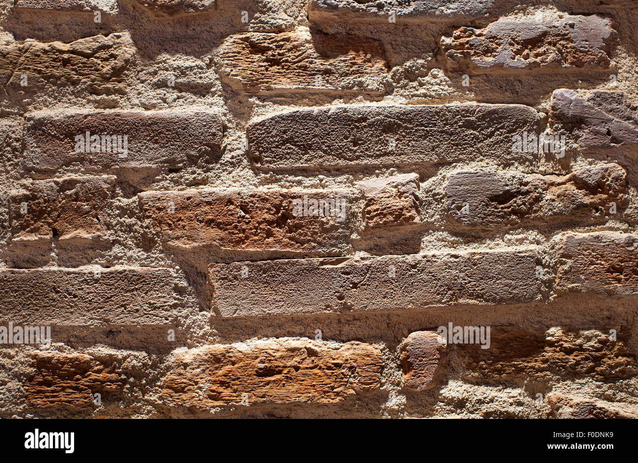 Brick wall background. Artistic and dramatic view of a brick wall using ...