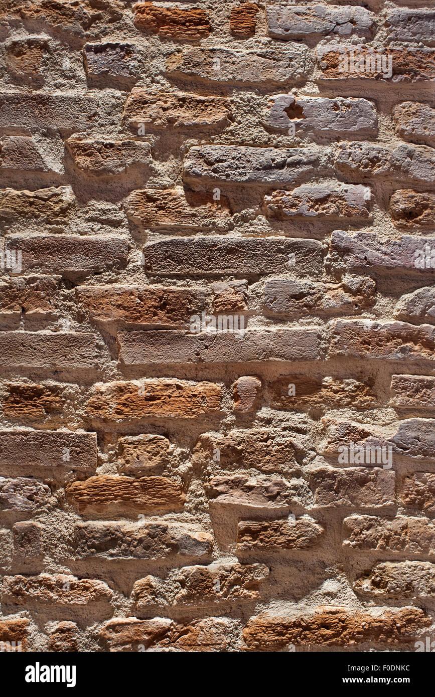 Brick wall background. Artistic and dramatic view of a brick wall using ...