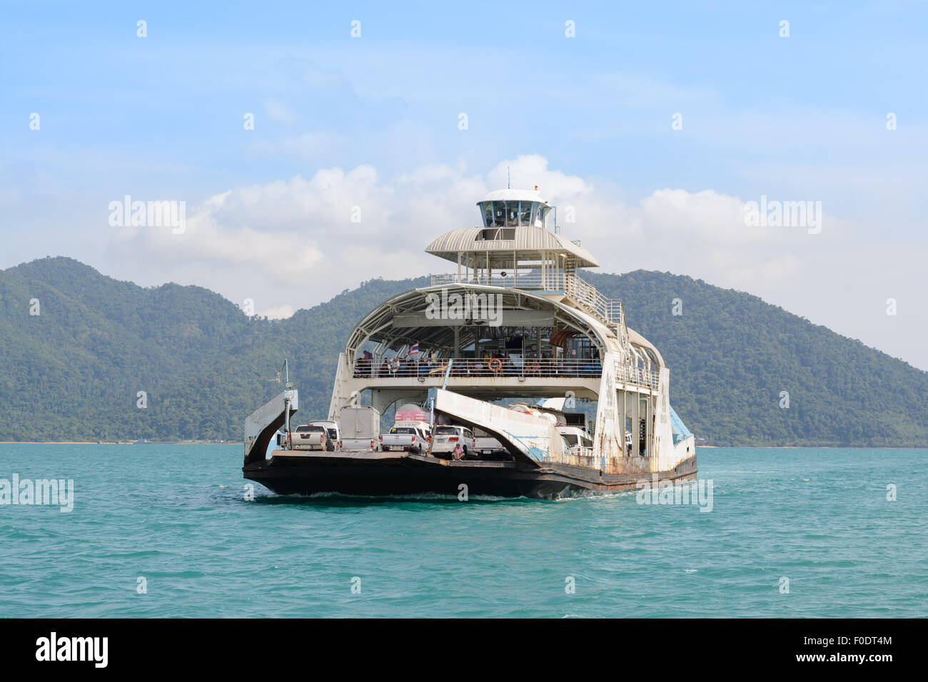 Trat, Thailand-April 29, 2015: Tourists and Cars loaded on ferry boat ...