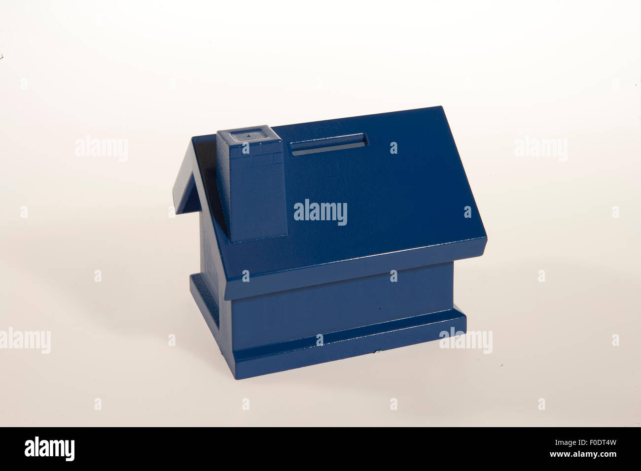 House shape money box hi-res stock photography and images - Alamy