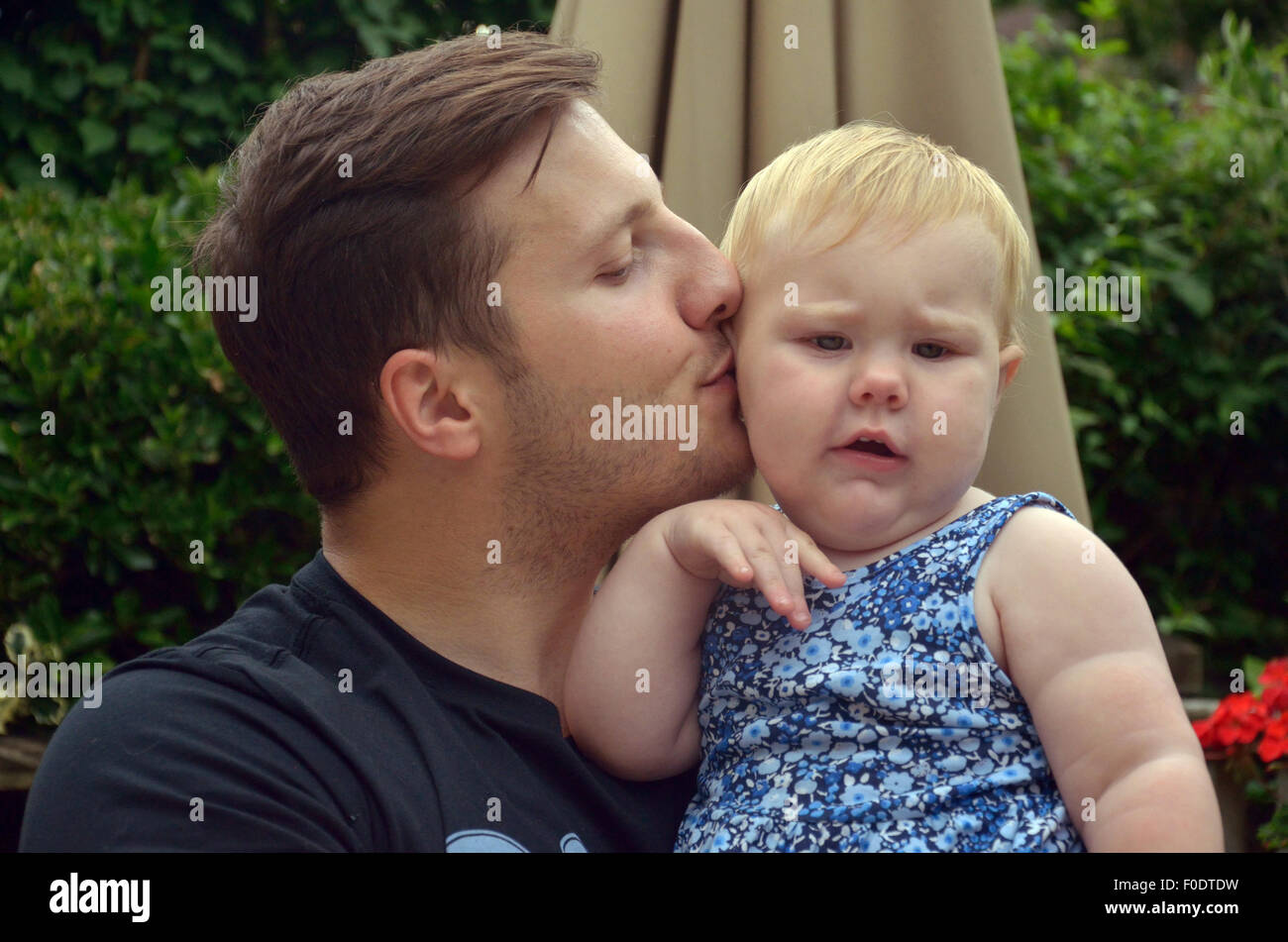 Father kissing old baby girl hi-res stock photography and images - Alamy