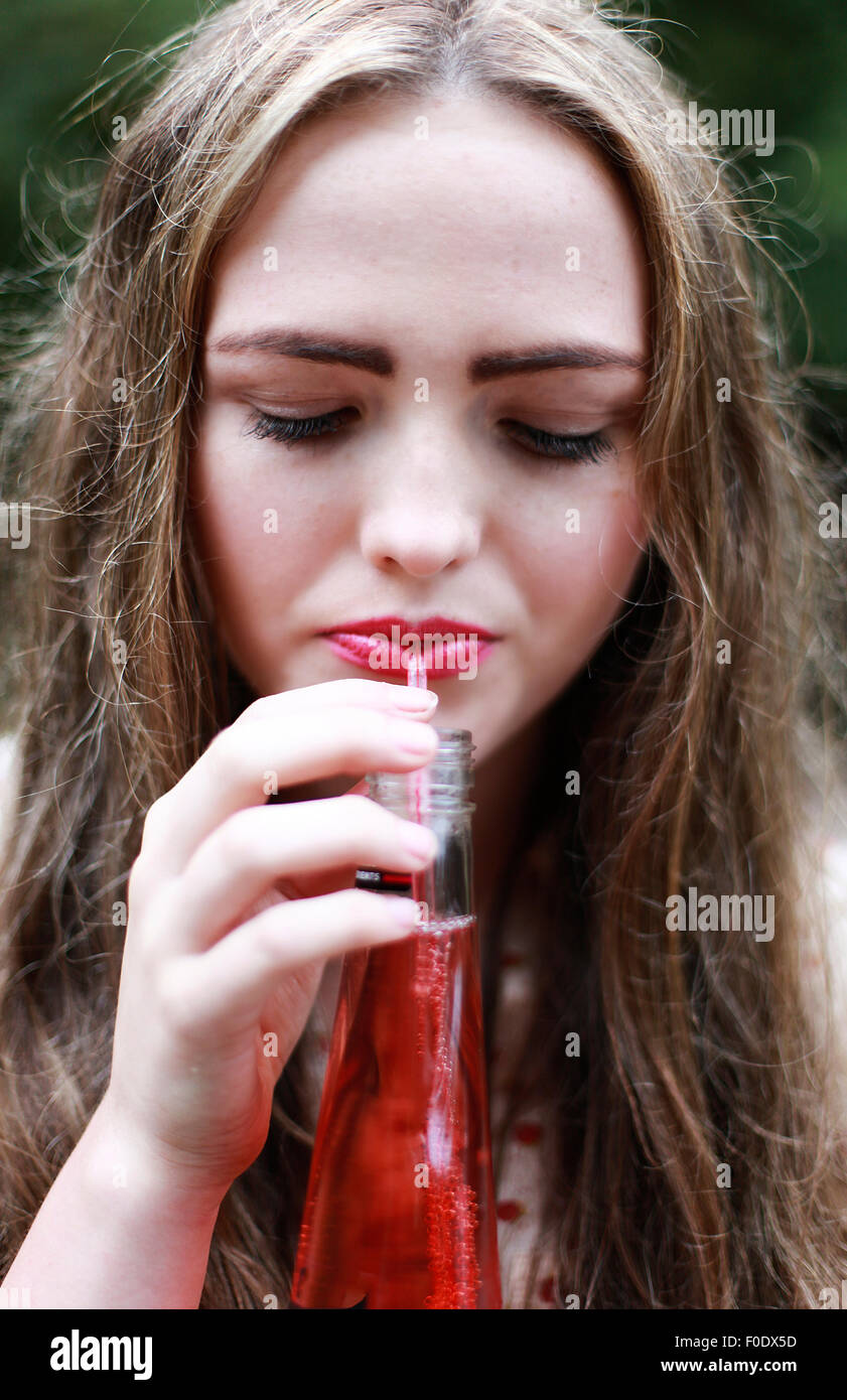 Drinking Through Straw High Resolution Stock Photography and Images - Alamy