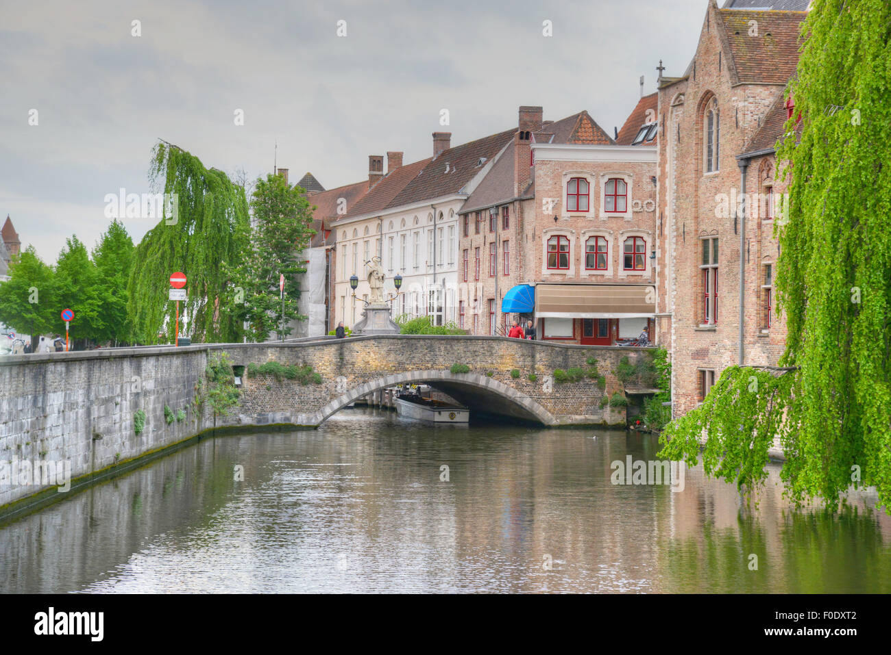 Water canal in Bruges, Belgium showing the bridges to which the city ...