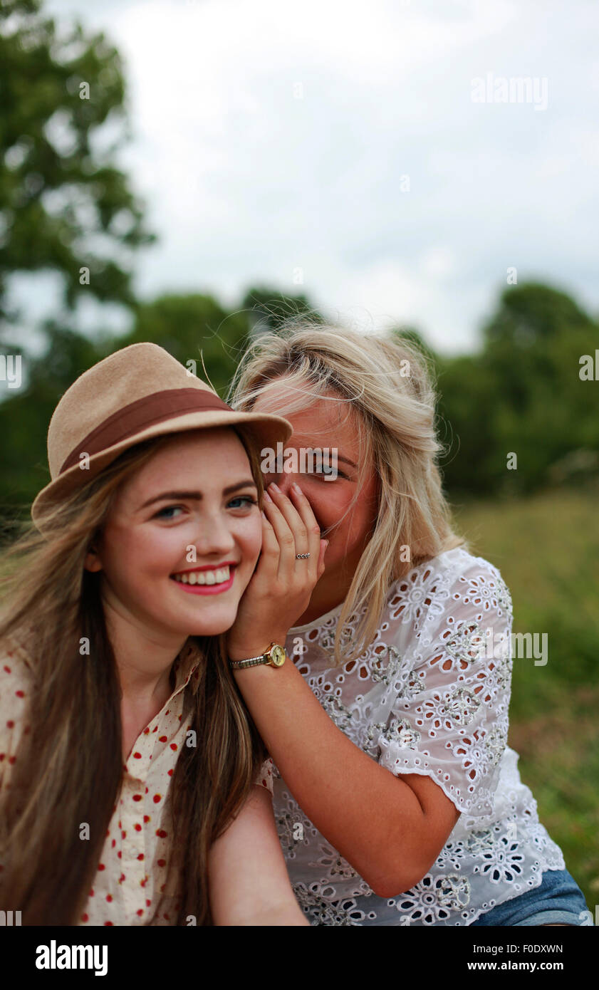 Two girls talking to each other hi-res stock photography and images - Alamy