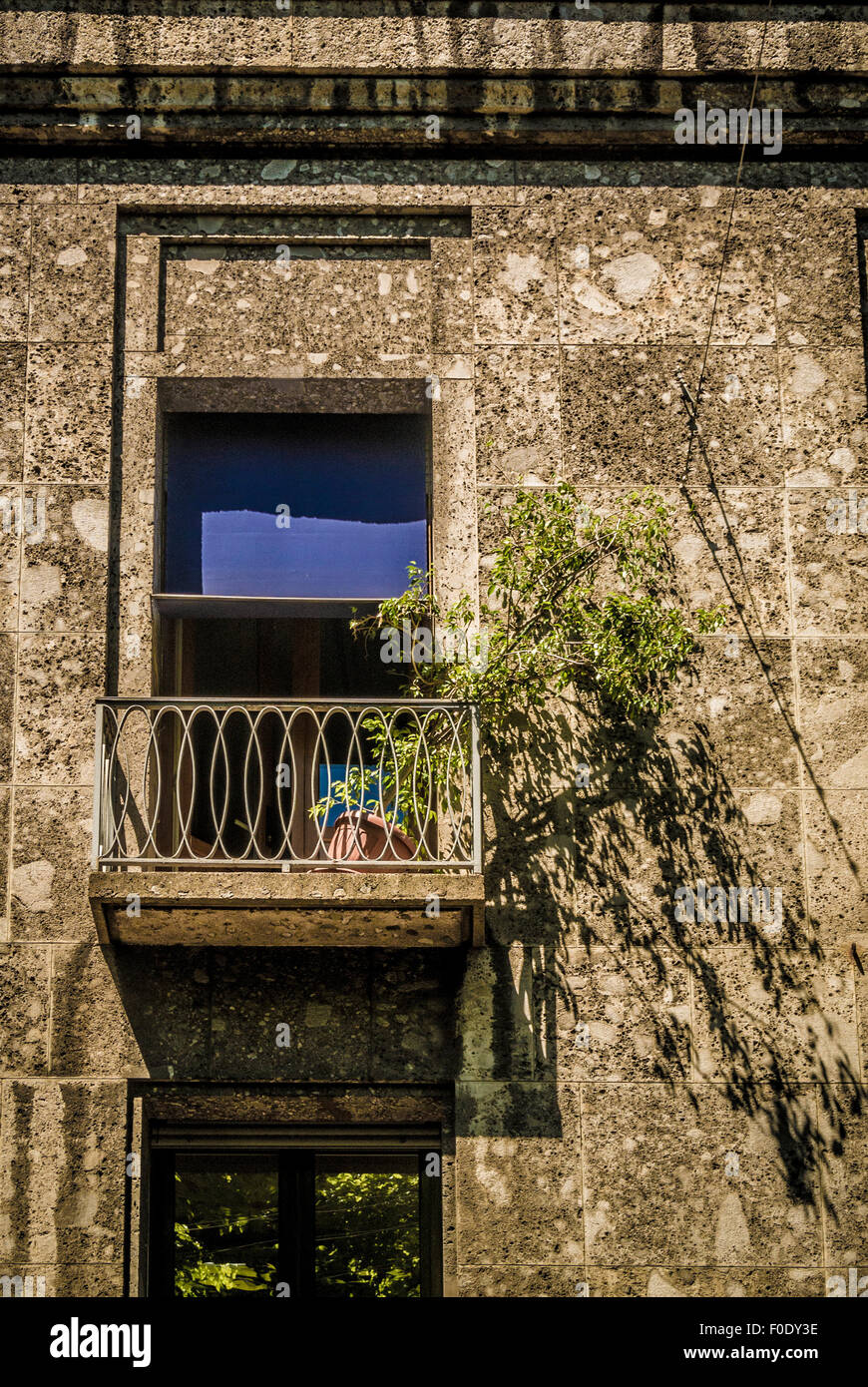 Exterior of a traditional multi-storey Milanese building. Milan, Italy ...