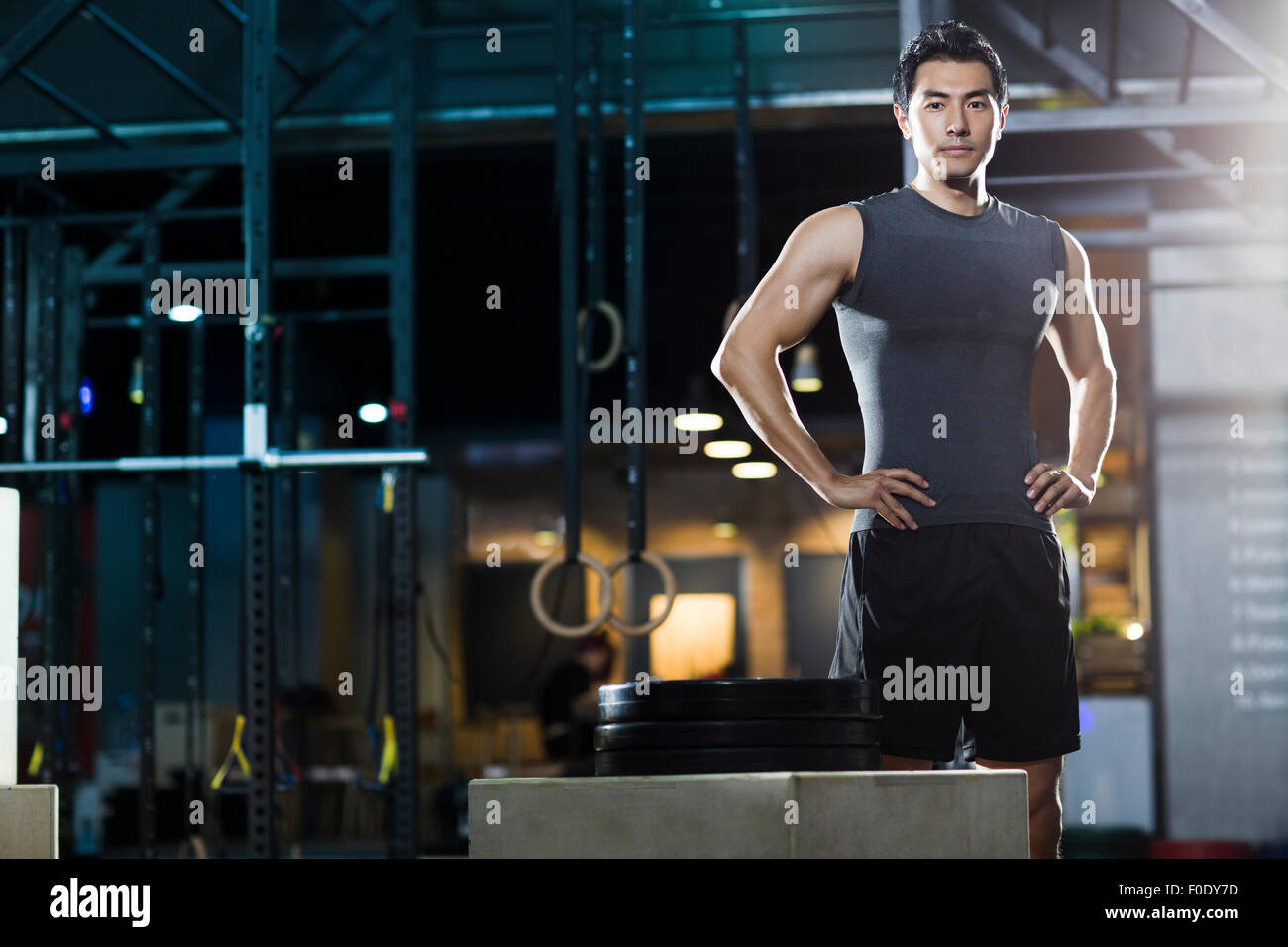 Portrait of young man at gym Stock Photo - Alamy