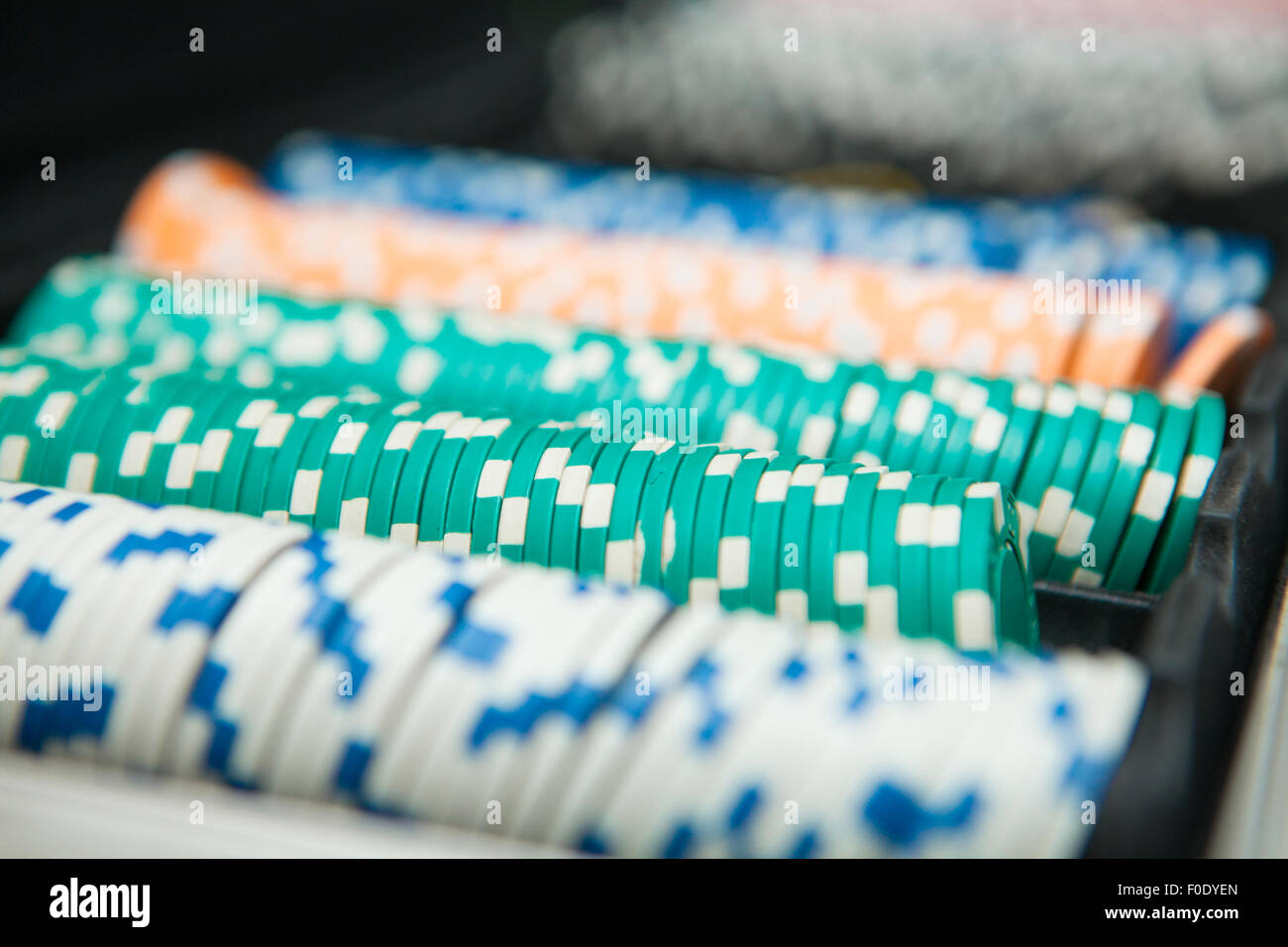 Poker Chips on a gaming table with dramatic lighting Stock Photo - Alamy