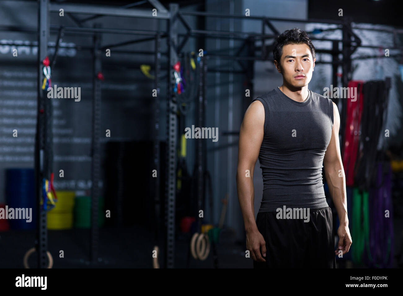 Portrait of young man at gym Stock Photo - Alamy