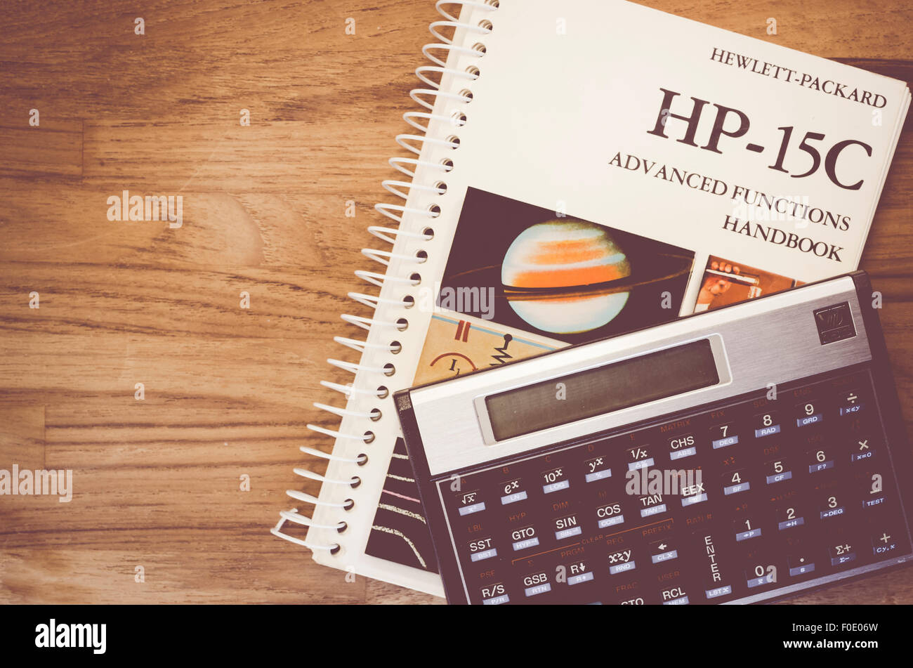 HP-15C Hewlett-Packard rpn scientific calculator and manual on a ...