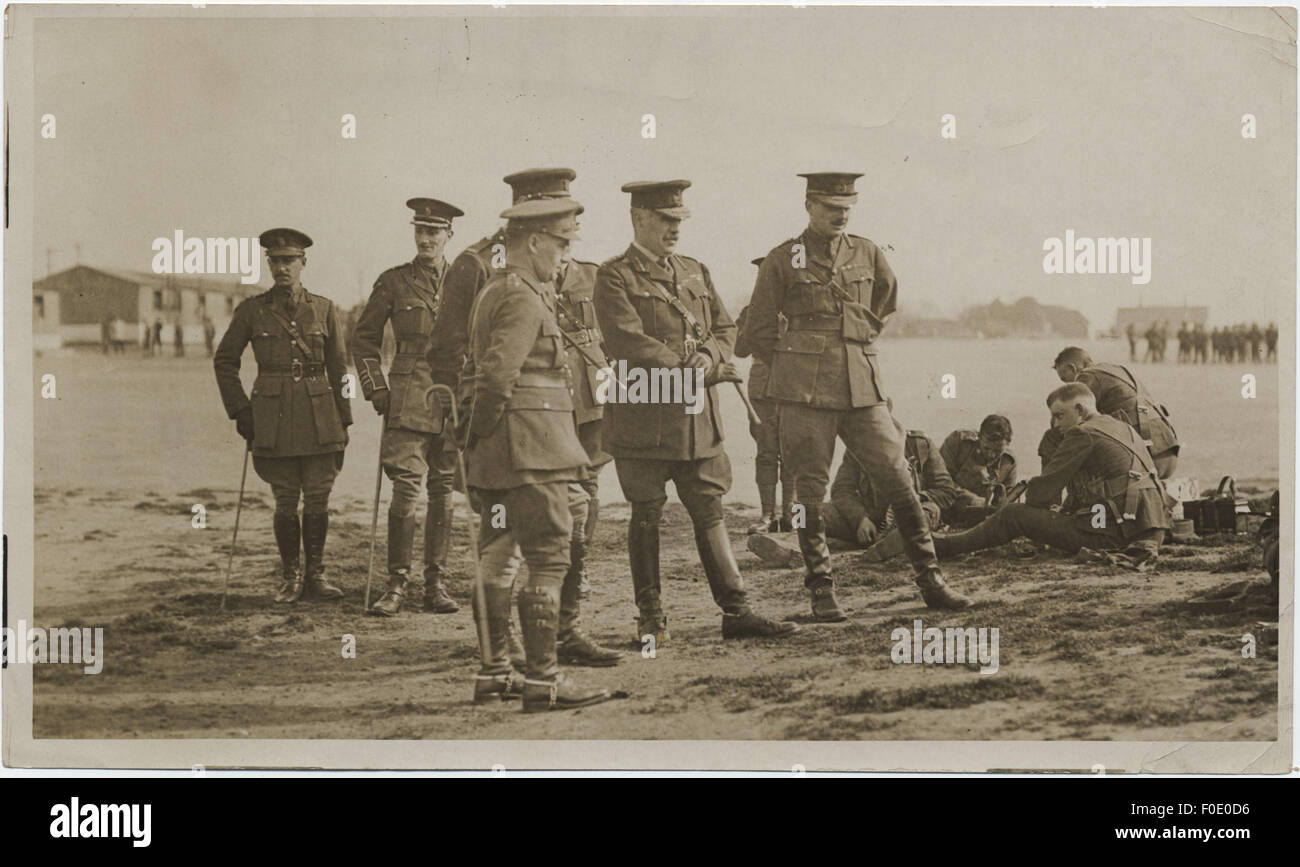 General Sir William Robertson inspects a machine gun depot, a ...