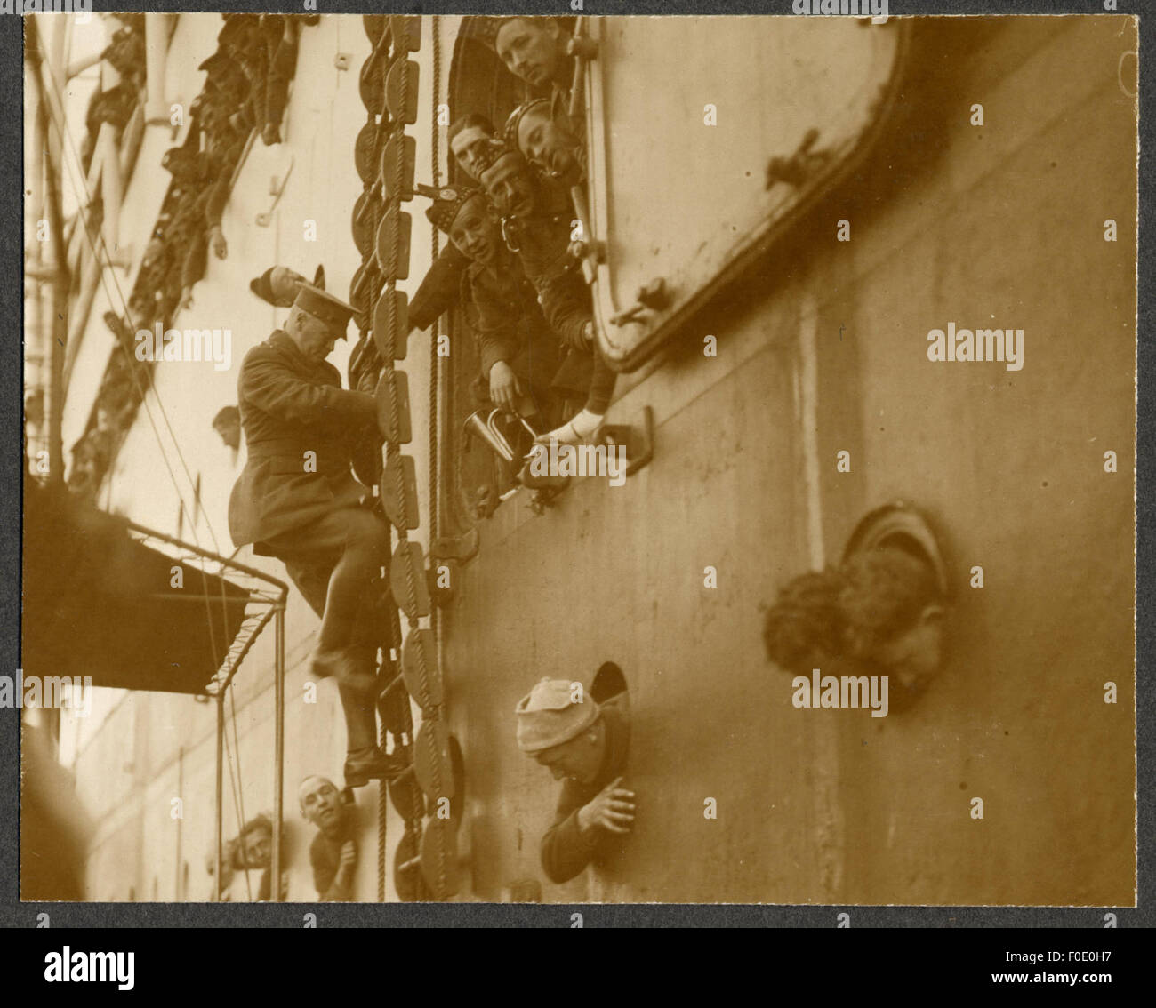 A photograph of Lieutenant Colonel Low boarding a ship, as featured in ...
