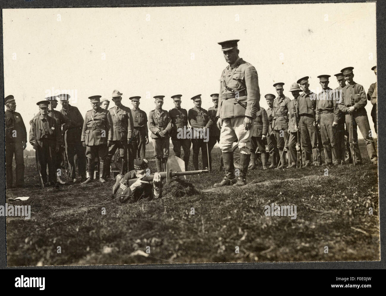 Colonel Sam Hughes observes Sergeant Hawkins demonstrating the use of ...