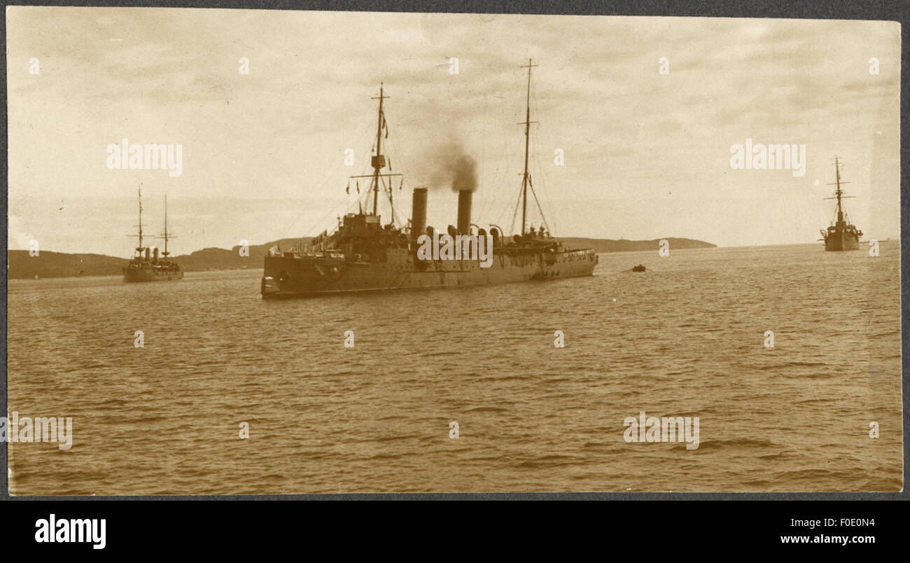 This photograph depicts a Royal Navy cruiser, which was part of a naval ...
