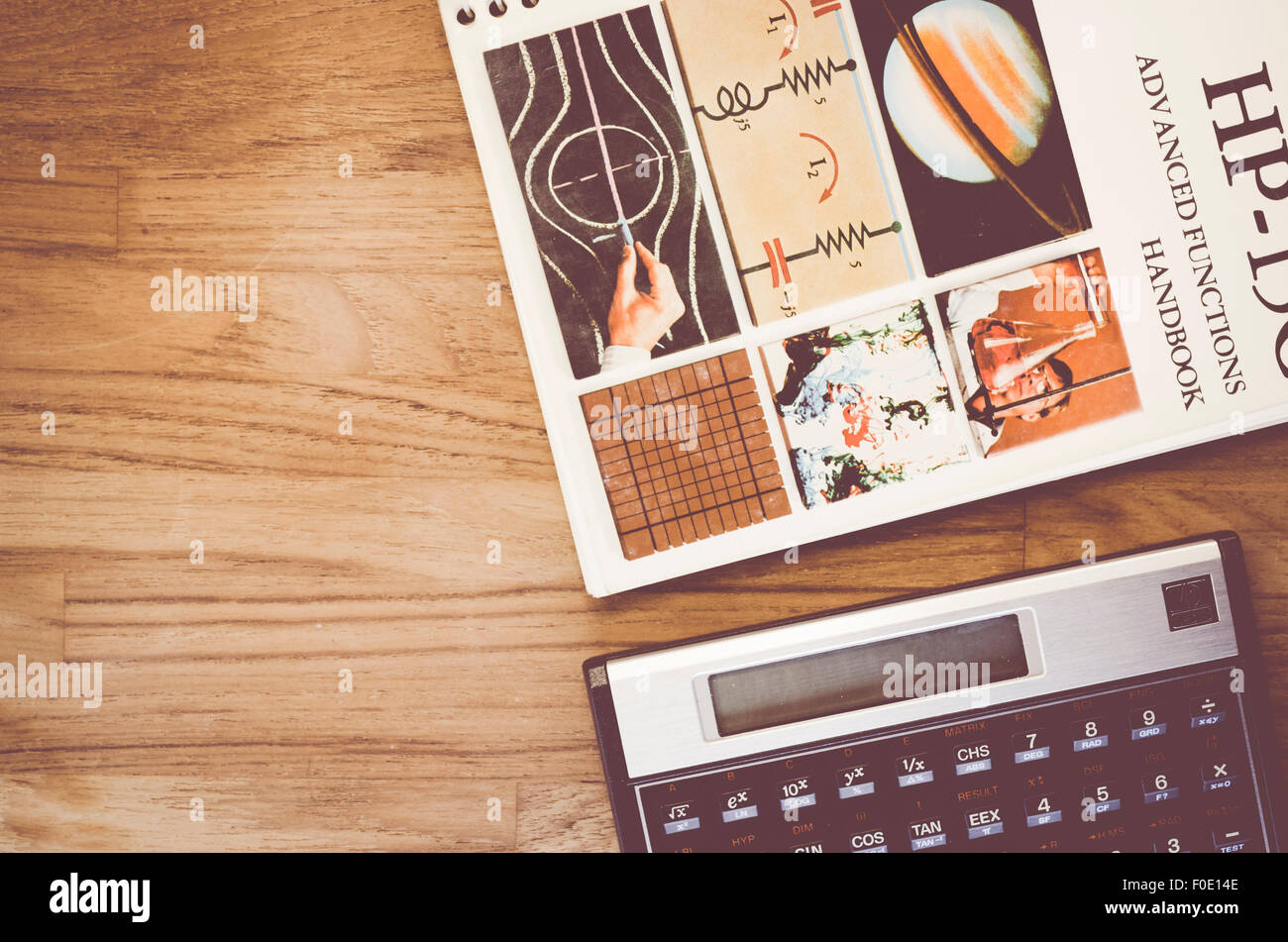 HP-15C Hewlett-Packard rpn scientific calculator and manual on a ...