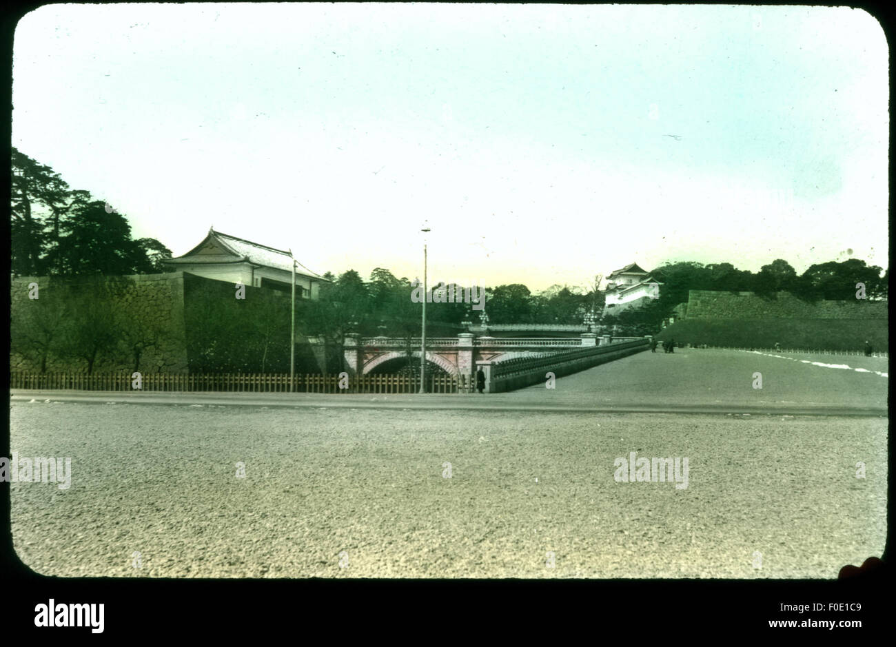 A photograph depicting a street scene with a road, sidewalk, and ...
