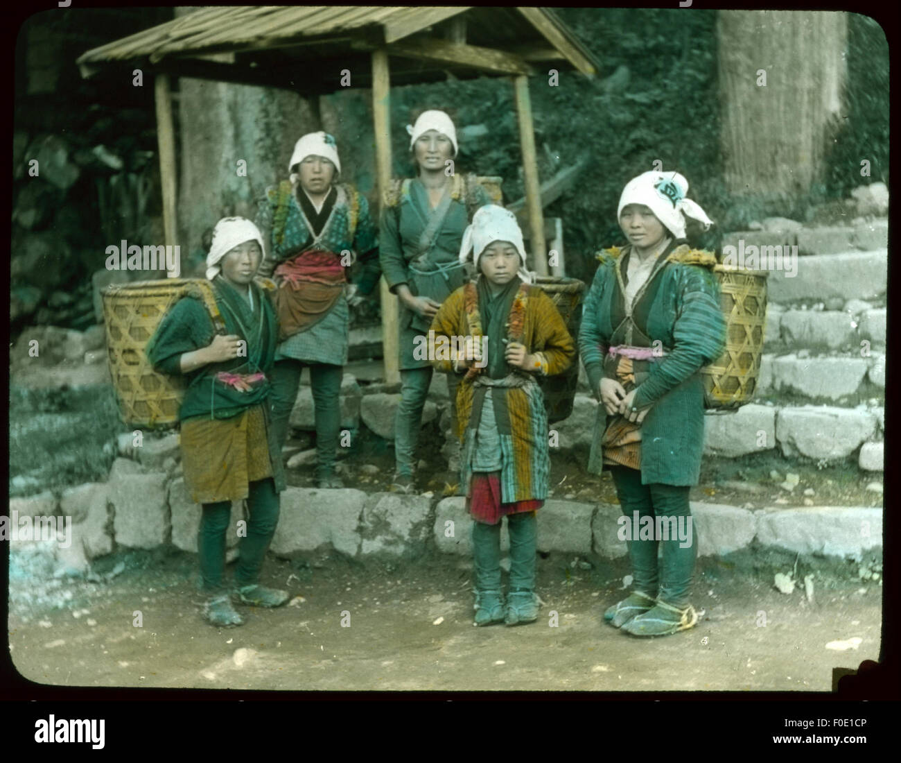This image features rural women dressed in traditional attire, carrying ...