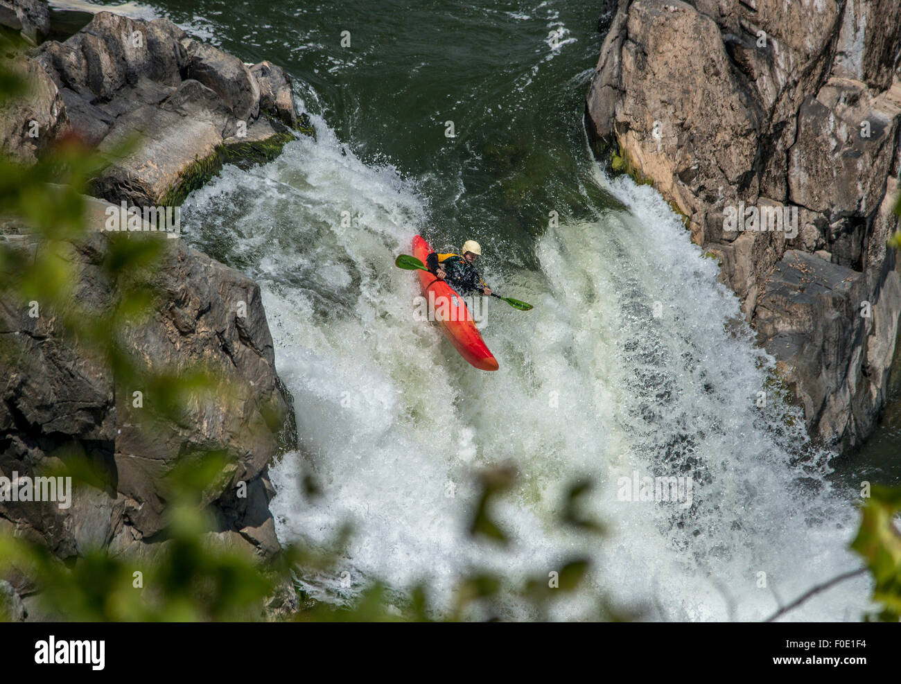 Scenes of two kayakers navigating the chutes at Great Falls National ...