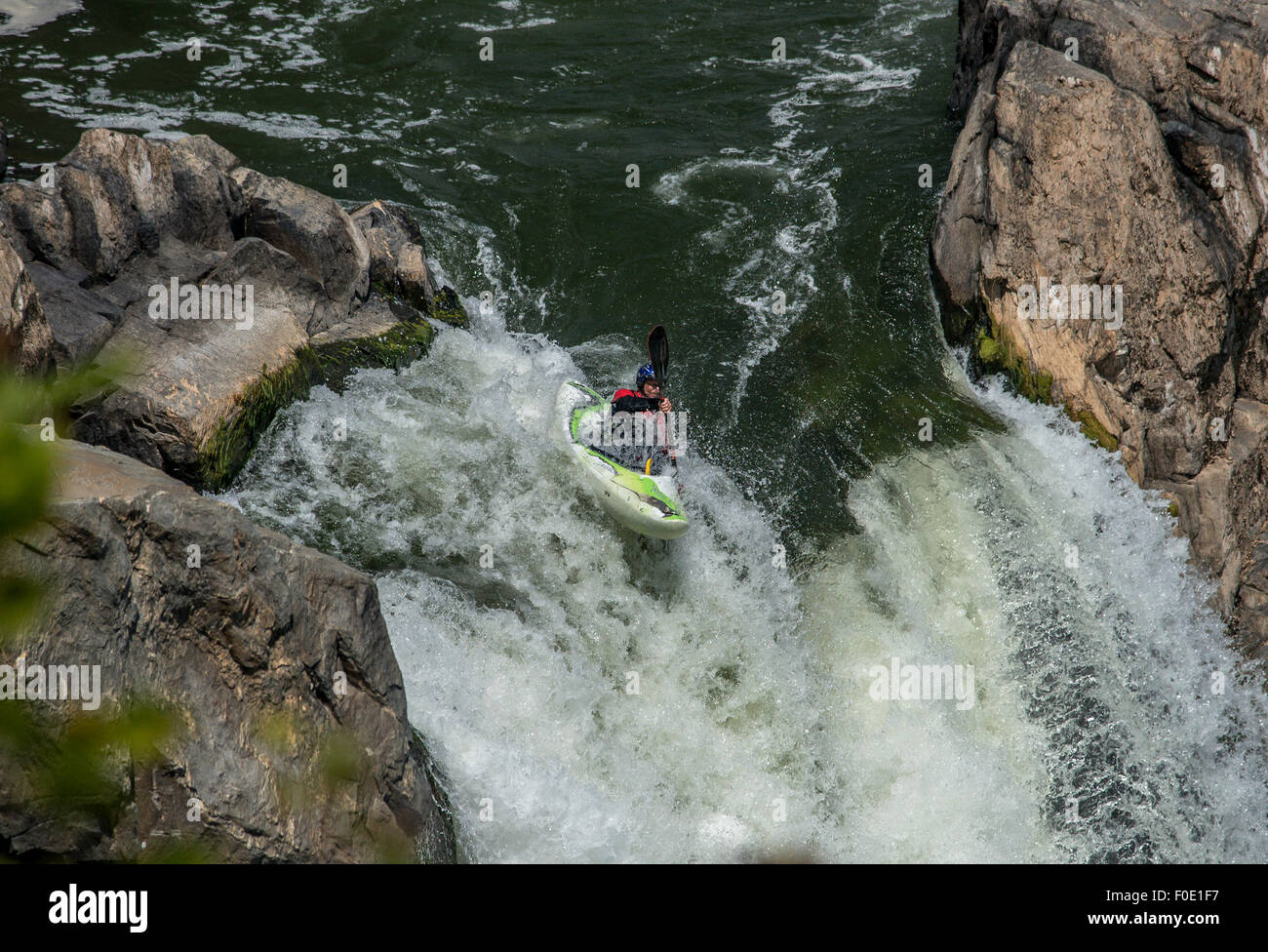 Scenes of two kayakers navigating the chutes at Great Falls National ...