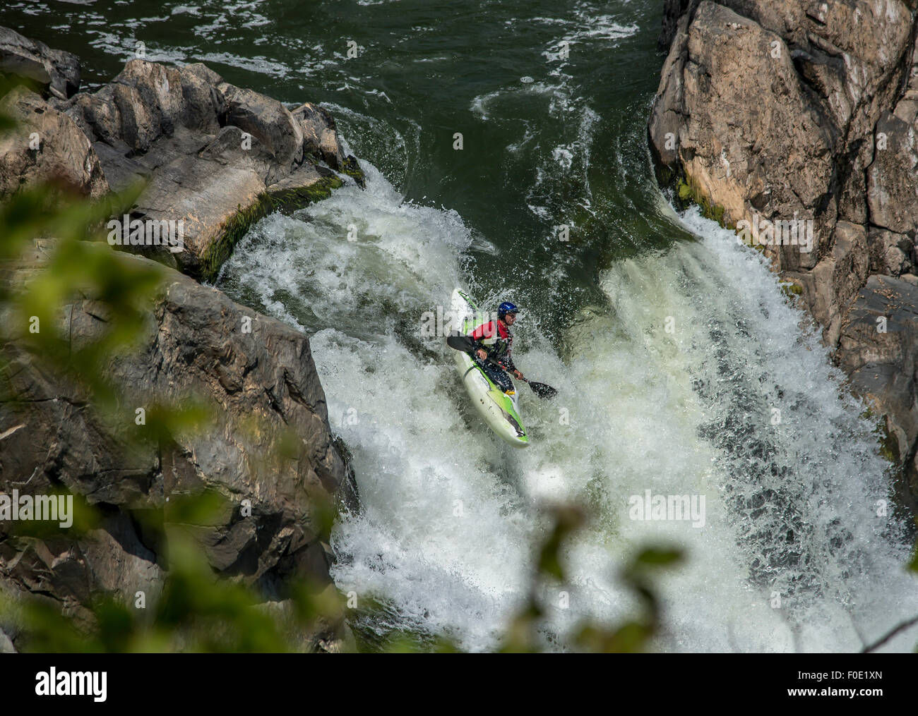 Scenes of two kayakers navigating the chutes at Great Falls National ...