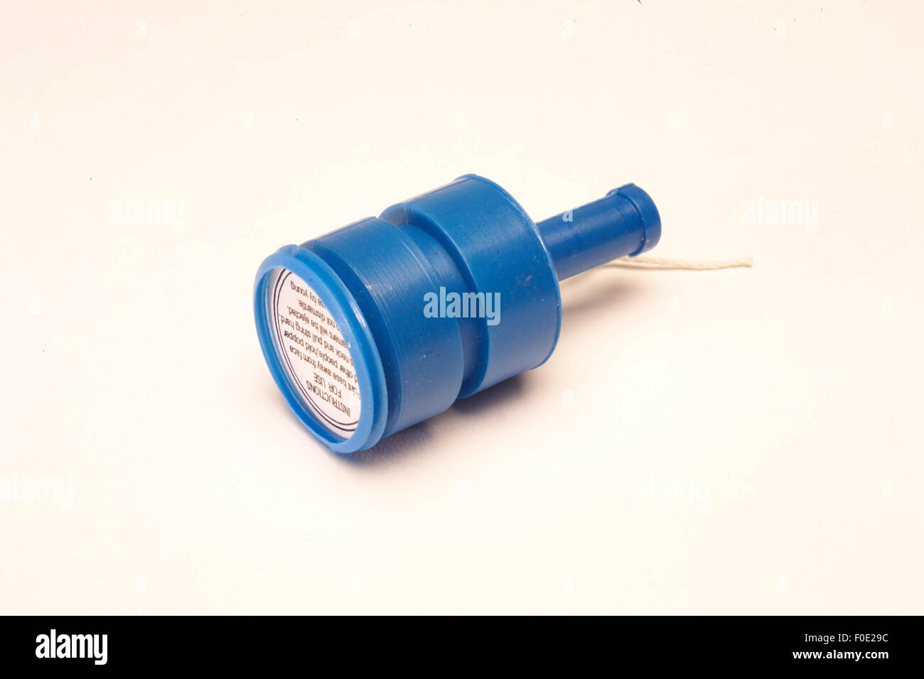 Blue plastic party popper on white background with slight shadow Stock ...