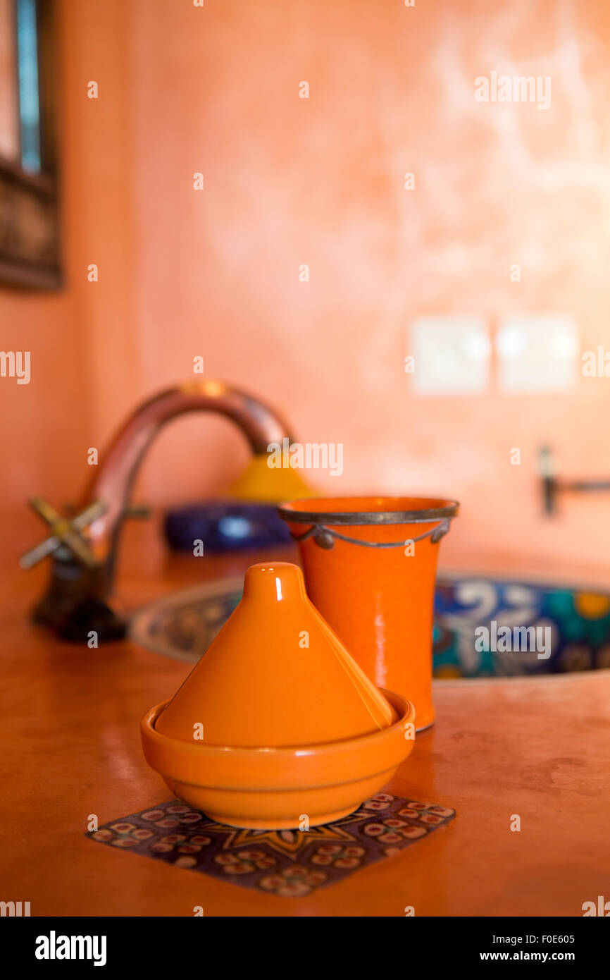Orange Moroccan decoration in traditional bathroom with blurred ...