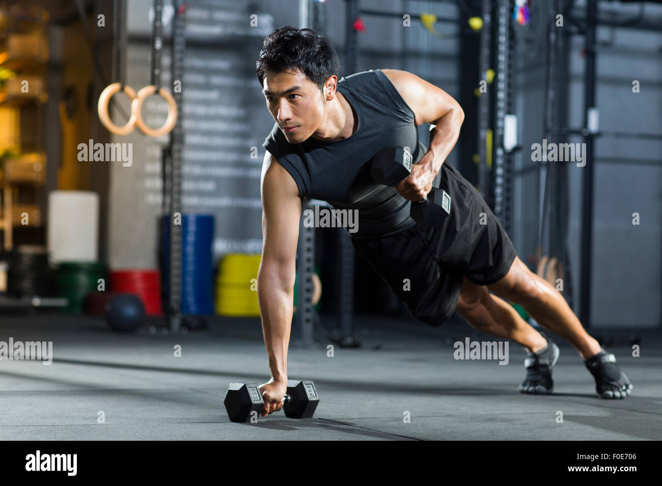 Young man practicing crossfit Stock Photo - Alamy