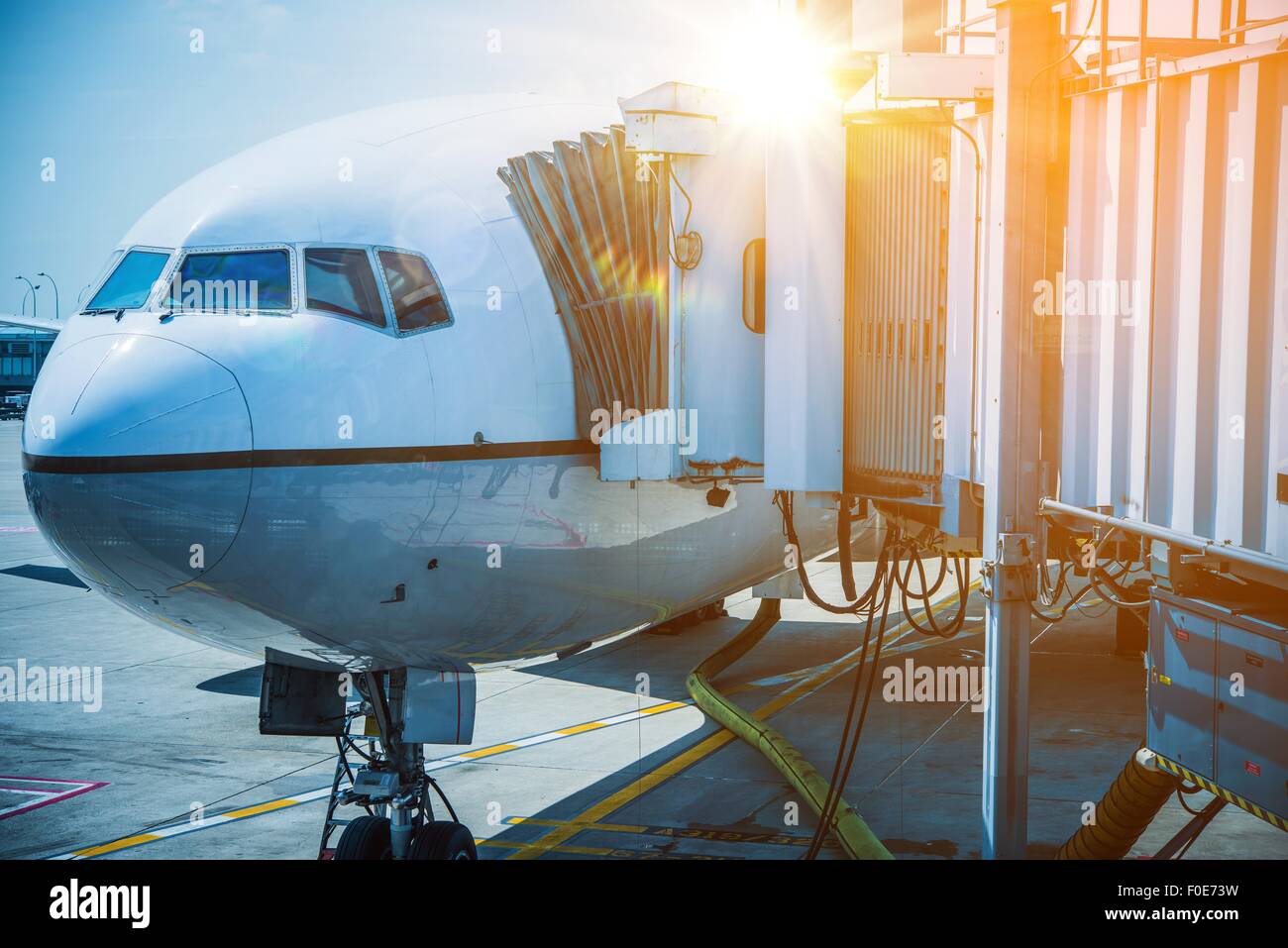 Docked Airplane Boarding Time. Airport Terminal. Modern Airliner ...