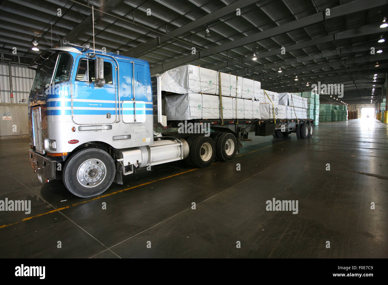 semi truck in warehouse Stock Photo - Alamy