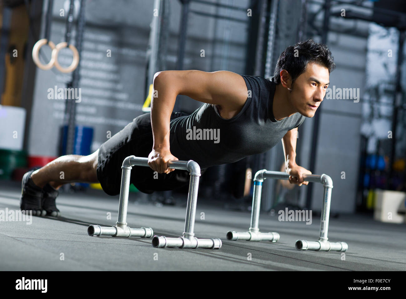 Young man practicing crossfit Stock Photo - Alamy
