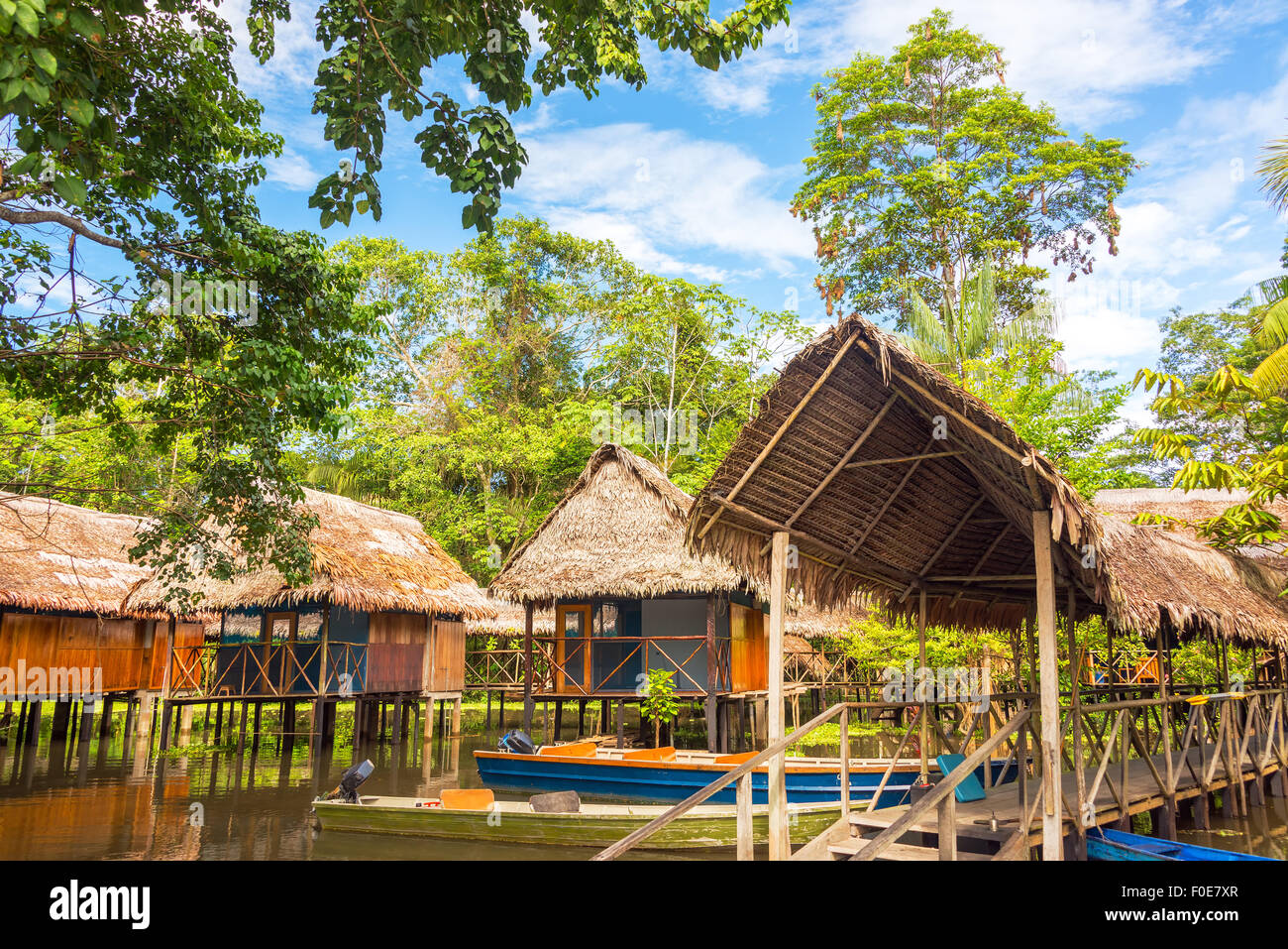 Jungle shacks on stilts in the Amazon rain forest near Iquitos, Peru ...