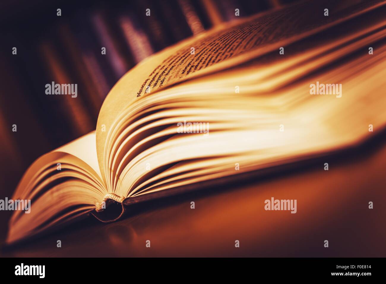 Open Old Book in the Library Closeup Photo. Mysterious Book Stock Photo ...